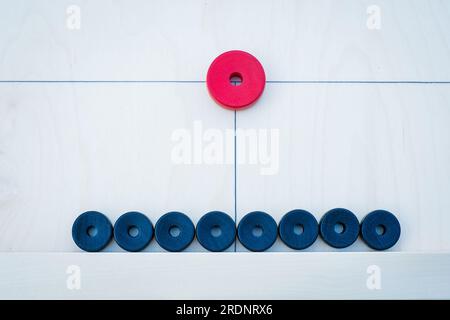 Novuss table with discs and cue stics Stock Photo - Alamy