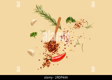 Flying spices and herbs on color background Stock Photo - Alamy