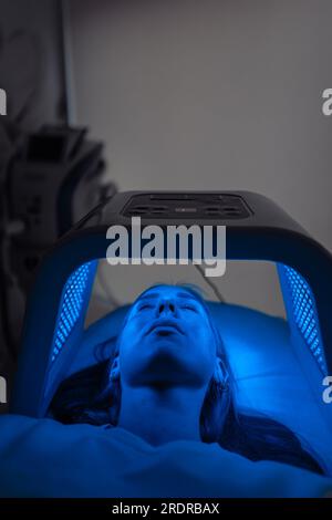 Facial skin care using an LED lamp Stock Photo - Alamy