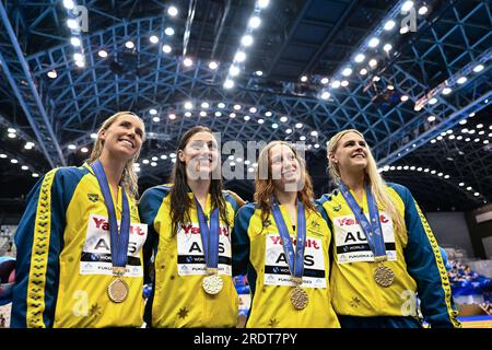 Gold medalists team Australia pose after the women's 4x200-meter freestyle relay final at the ...