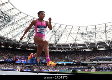 United States' Tara Davis-Woodhall smiles as she stands next to her ...