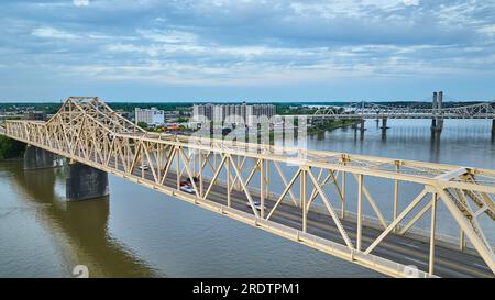 White gold truss bridge stretching across large river Ohio River aerial ...