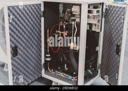 Soundproof cabinet for compressor refrigeration unit Stock Photo - Alamy