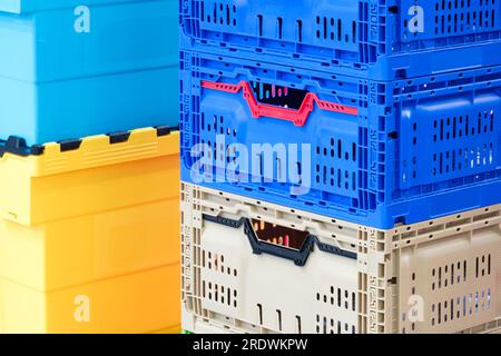 Colorful plastic boxes, logistic concept Stock Photo - Alamy