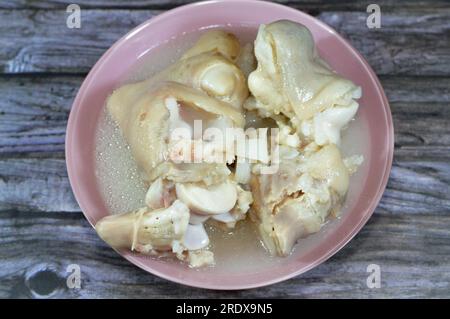 Arabic Egyptian cuisine of kawareh trotters with its traditional soup ...