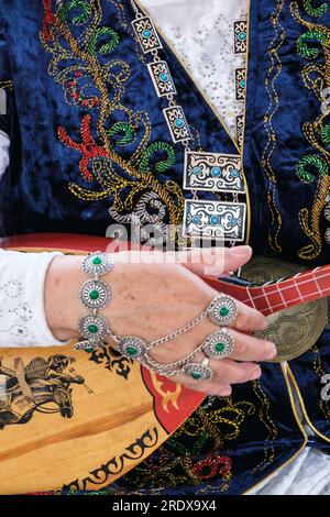 Kazakhstan, Huns Ethno Village. Woman Demonstrating Traditional Kazakh ...