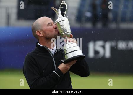 United States' Brian Harman poses with the Claret Jug trophy after ...
