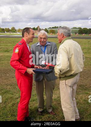 Red Arrows team leader, Red 1, Spike Jepson, presenting commemorative ...