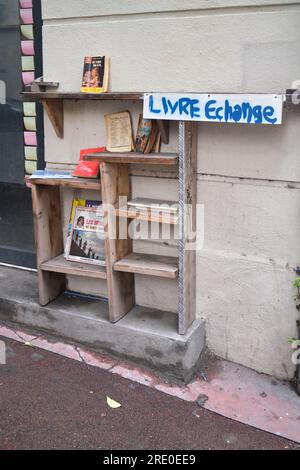 Book shelf on open street invites everyone to take the piece of wisdom ...