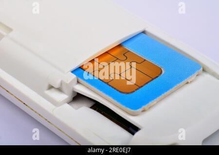 Wireless modem and SIM card modem on a white background Stock Photo - Alamy