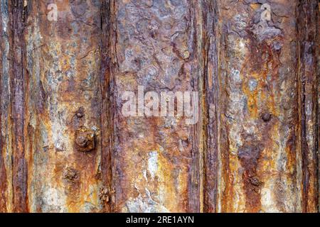 A section of heavily rusted and corroded iron breakwater Stock Photo ...
