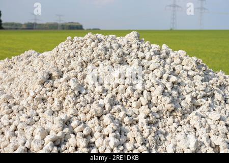 Agriculture: marl limestone soil enriching agent on a field. Addition ...