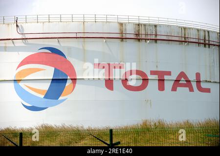 Storage tank in a refinery with the former Total logo Stock Photo - Alamy