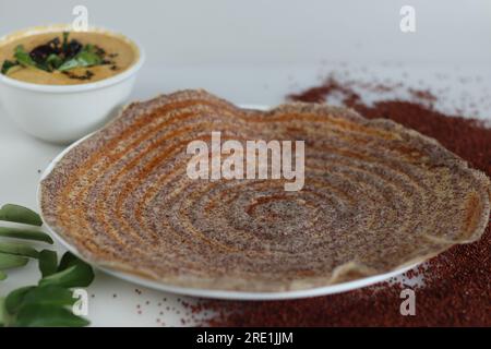 Ragi ghee roast. Crispy crapes made with fermented batter of finger ...