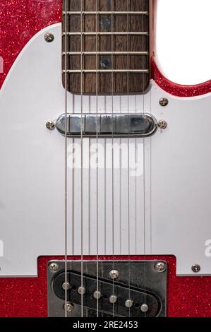 Detail of a telecaster electric guitar where we can see its pickup ...