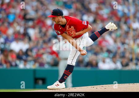Cleveland Guardians starting pitcher Tanner Bibee looks to the crowd as ...
