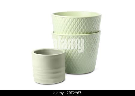 Different empty ceramic flower pots on white background Stock Photo - Alamy