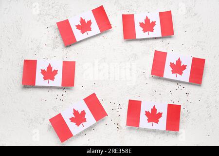 Frame made of paper Canadian flags on grunge background Stock Photo - Alamy