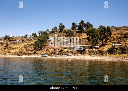 View of the shores and harbour of the island of Taquile on Lake ...