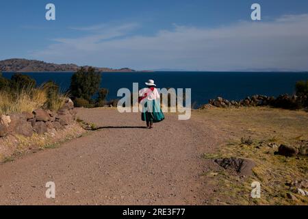 Traditional stone arch of the Llachon peninsula, in the Lake Titicaca ...