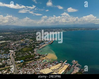 Residential buildings in Cotabato City. Skyline. Blue sky with clouds. Mindanao, Philippines ...