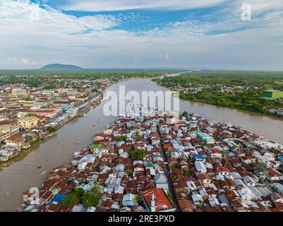 Residential buildings in Cotabato City. Skyline. Blue sky with clouds. Mindanao, Philippines ...