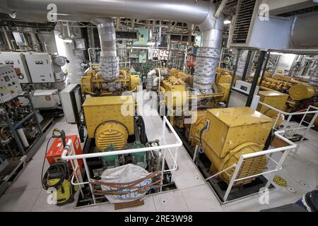 Power Plant generator room generators uae interior Stock Photo - Alamy