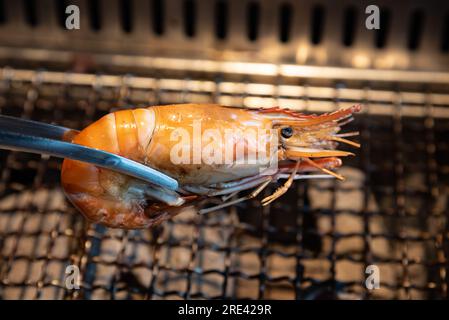 Prawn grilled with a stove background, barbecue prawn Stock Photo - Alamy