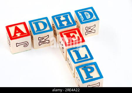 ADHD and Help in kids letter blocks on white Stock Photo - Alamy