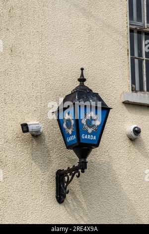 garda Sign outside rural station Stock Photo - Alamy