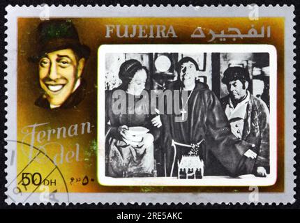 FUJEIRA - CIRCA 1971: a stamp printed in Fujeira shows The Forge of ...