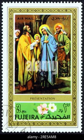 FUJEIRA - CIRCA 1971: a stamp printed in Fujeira shows The Forge of ...