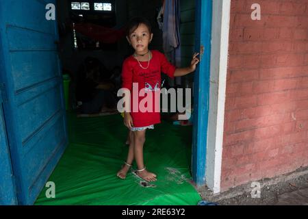 Meitei community man stays in a makeshift shelter after a mob burn ...