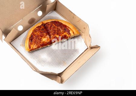 Half margherita pizza in cardboard box on white background. Pizza ...