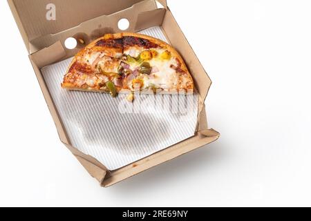 Paneer pizza in open delivery box in cardboard box on white background ...