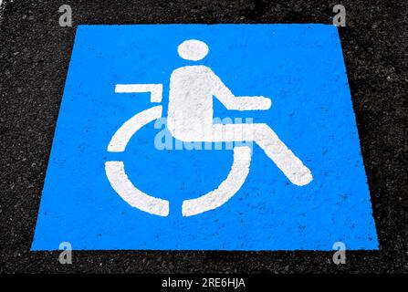 International symbol of access (ISA) showing a person in a wheelchair ...