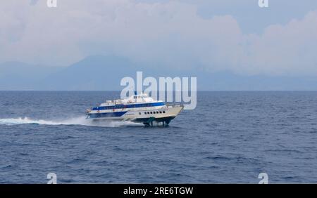 Caremar hydrofoil Aldebaran at speed crossing the Bay of Naples with ...