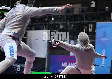 Kento Hoshino of Japan (R) fights against Luca Curatoli of Italy during ...