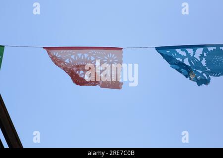 colorful handmade tissues hanging on a clothes rope Stock Photo - Alamy