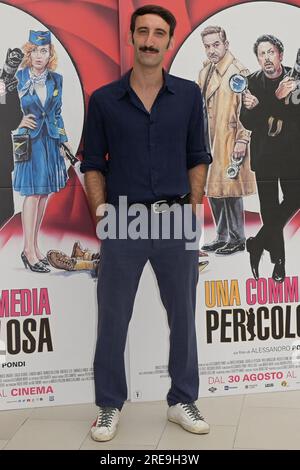 Giuseppe Lo Piccolo attends the photocall of movie Una commedia ...