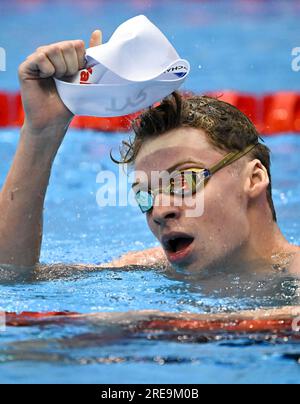 Leon Marchand of France reacts after competing in the men's 200-meter ...