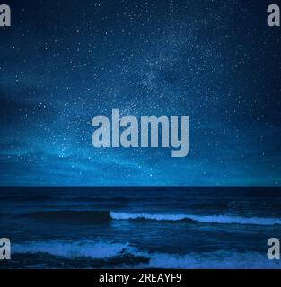 Starry sky over the sea. Fantastic Milky Way. Meteor shower Stock Photo ...