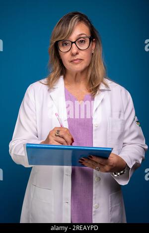 Photo of pretty sweet woman dressed plaid shirt smiling typing modern ...