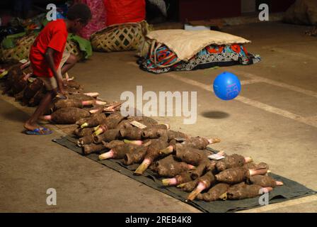 Boy playing with a blue balloon, Port Vila Markets, Port Via, Vanuatu ...