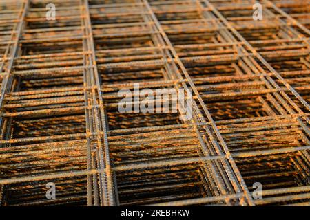 Stack of welded wire mesh, WWM, ready to be installed within a sidewalk ...