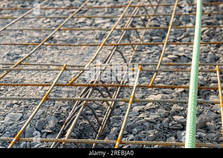 Welded wire mesh, WWM, installed within a sidewalk concrete form prior ...