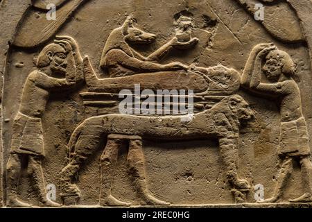 Funerary stela of Ankh-Hapy (with an aramaic inscription). Anubis ...