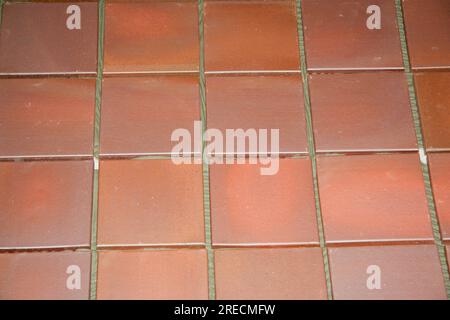 Newly laid reddish brown floor tiles in a makeover at the Crown Hotel ...