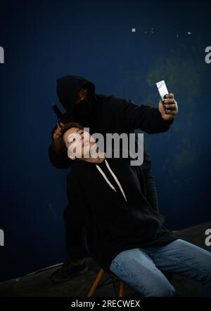 Scared man, kidnap with gun and phone call for money, ransom ...