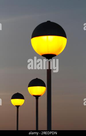 Spherical yellow street lamps on El Morro at sunset, Arica, Chile Stock ...